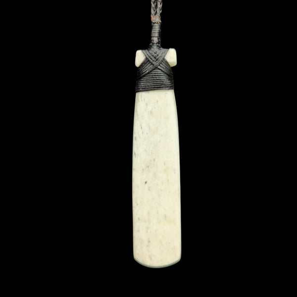 Hei Toki Parāoa -Whale bone Adze Pendant - Sands Carving Studio