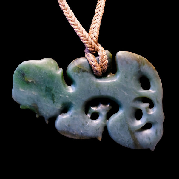 Inanga Pounamu Hei Tiki by Whare Bidois - Sands Carving Studio